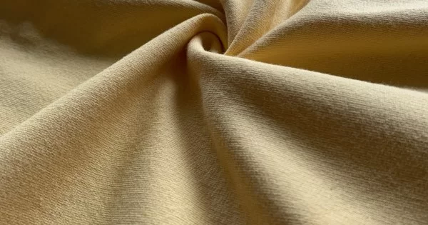 Brushed back cotton fleece with spandex